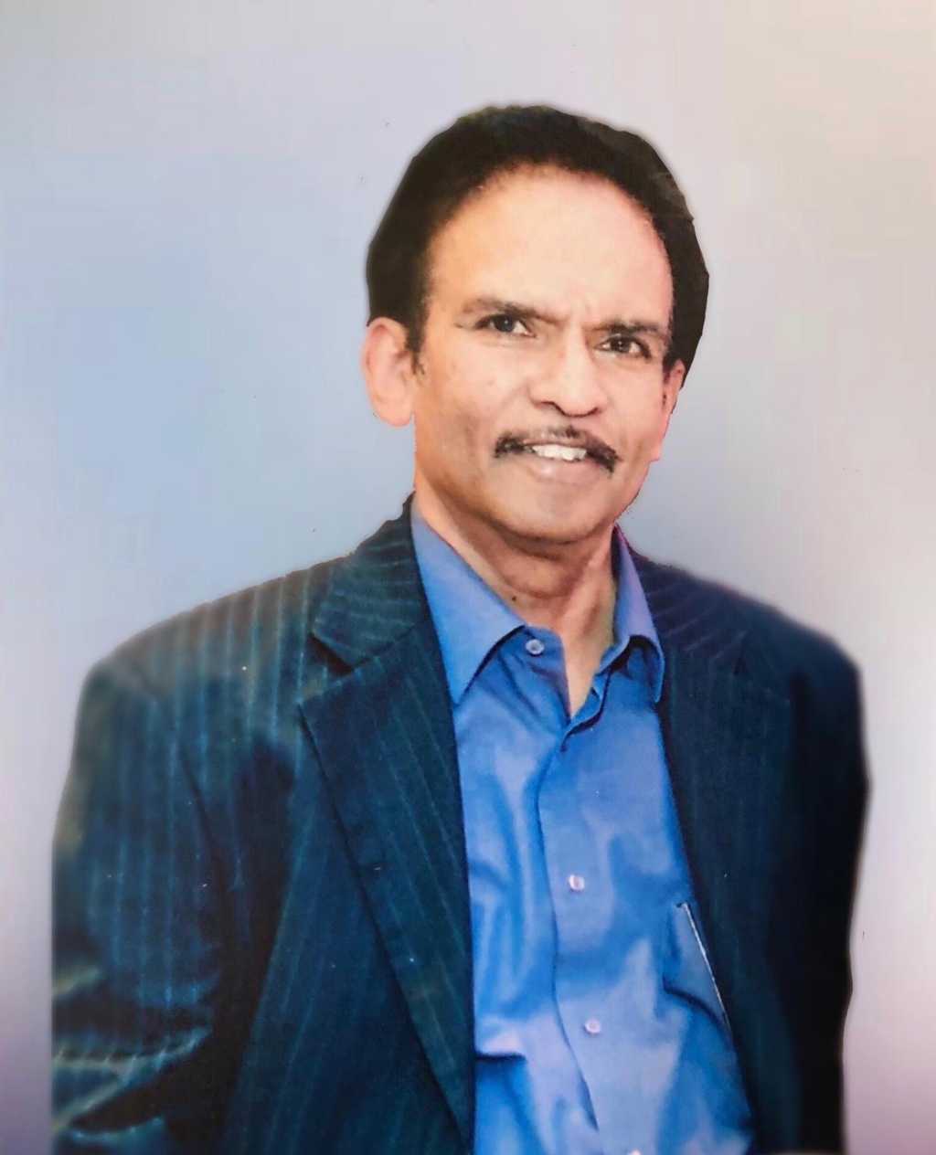 In Memory | John Thava